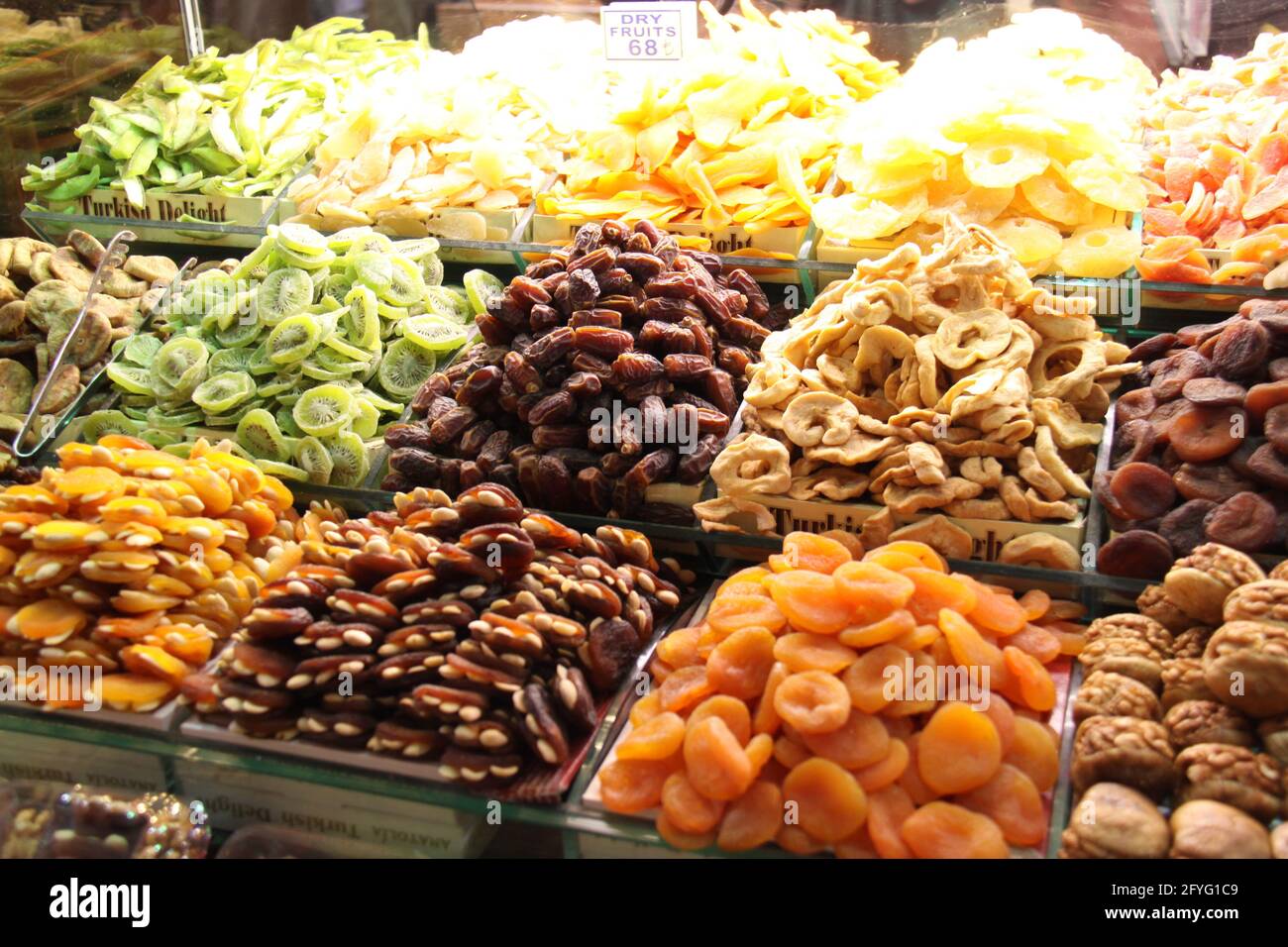 colorful dried fruits showcased as merchandise in a market stall Stock ...