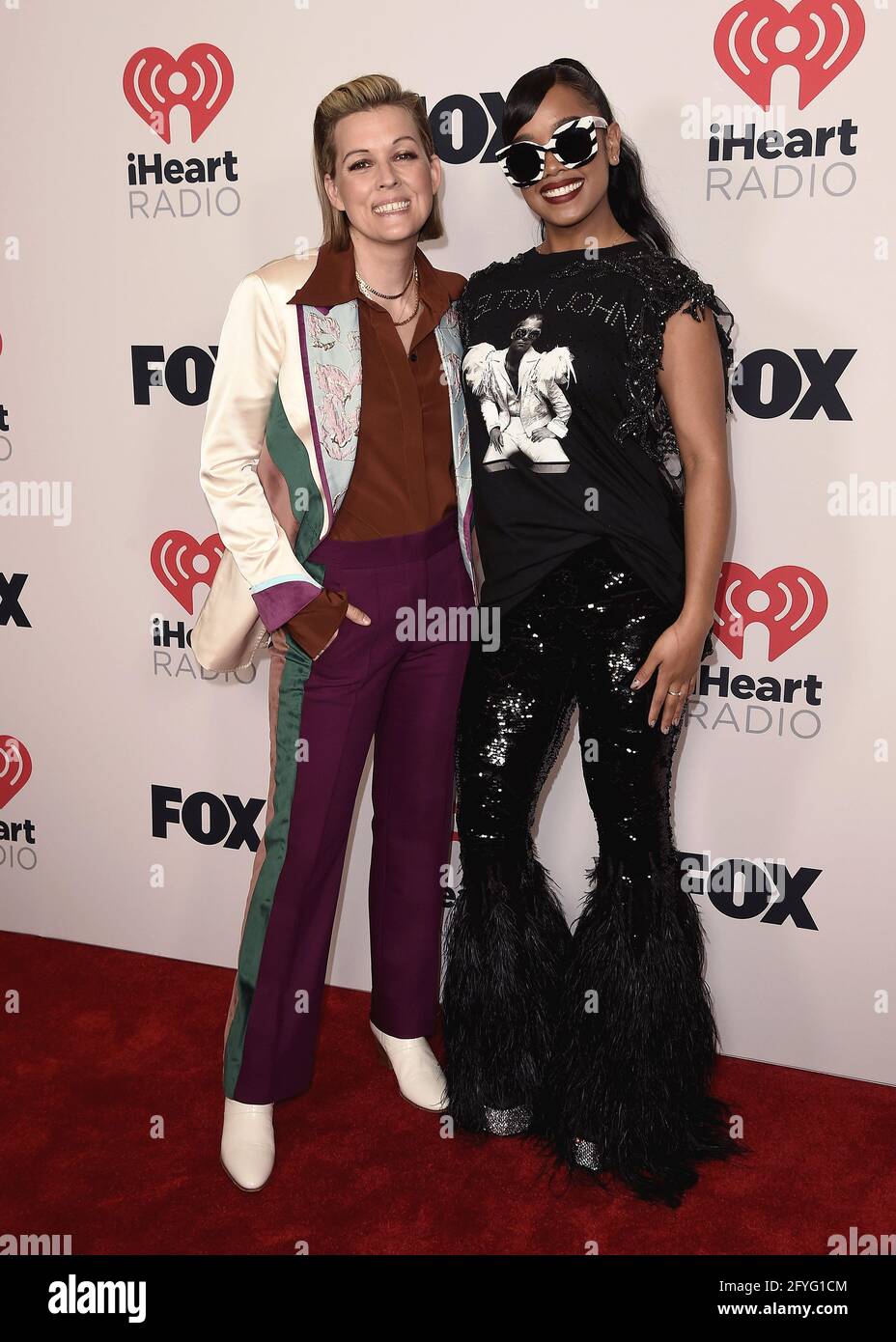 2021 IHEART RADIO MUSIC AWARDS: Brandi Carlile and H.E.R. attend the ...