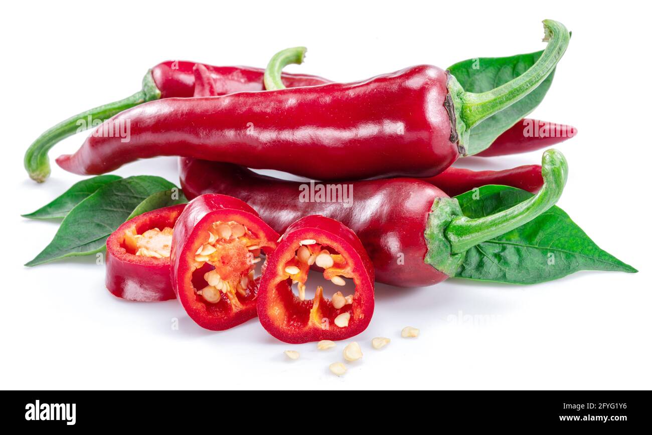 Fresh red chilli pepper and cross sections of chilli pepper with seeds ...