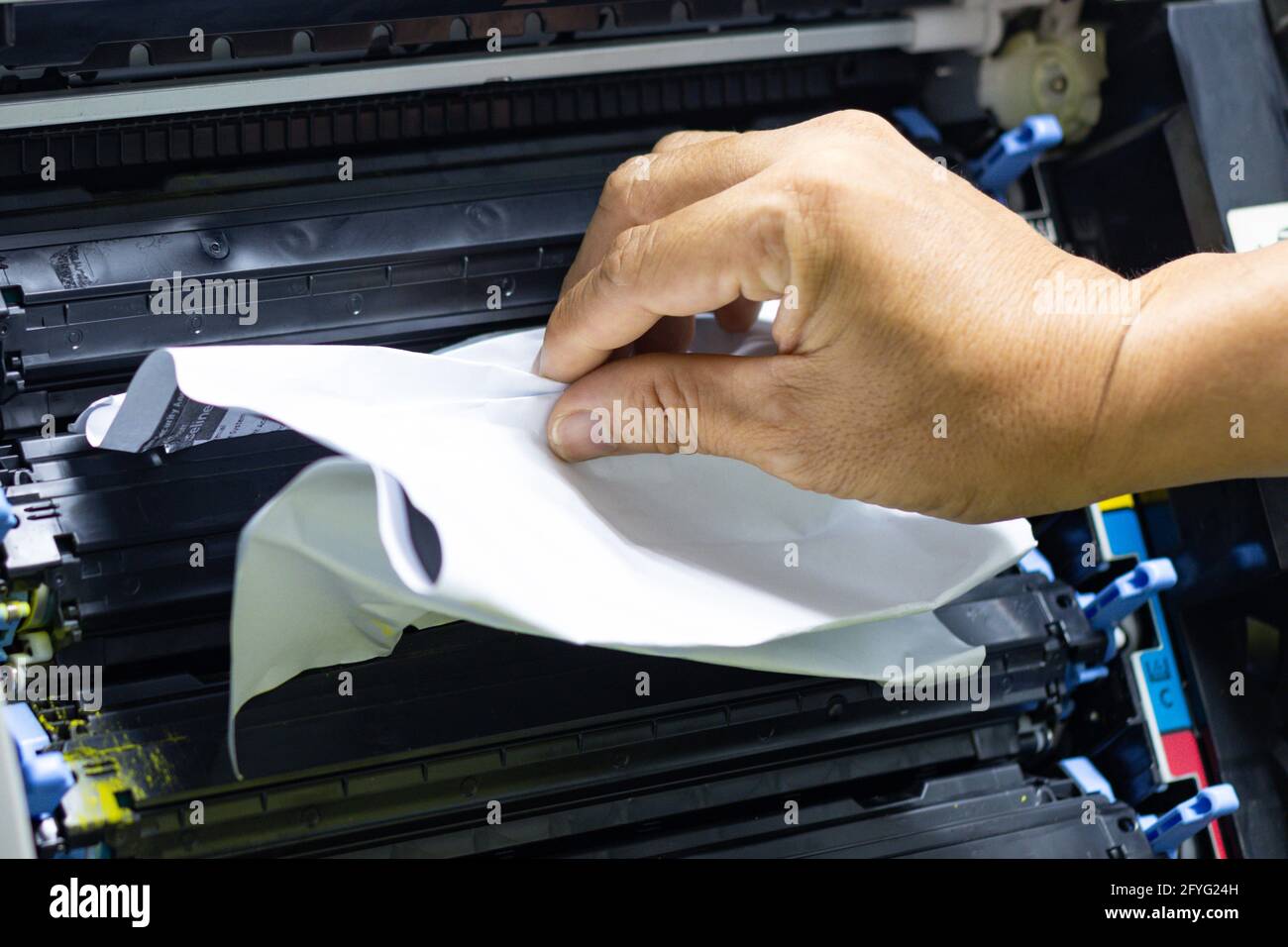 Technicians Removing Paper Stuck, Paper Jam In Printer At Office Stock ...