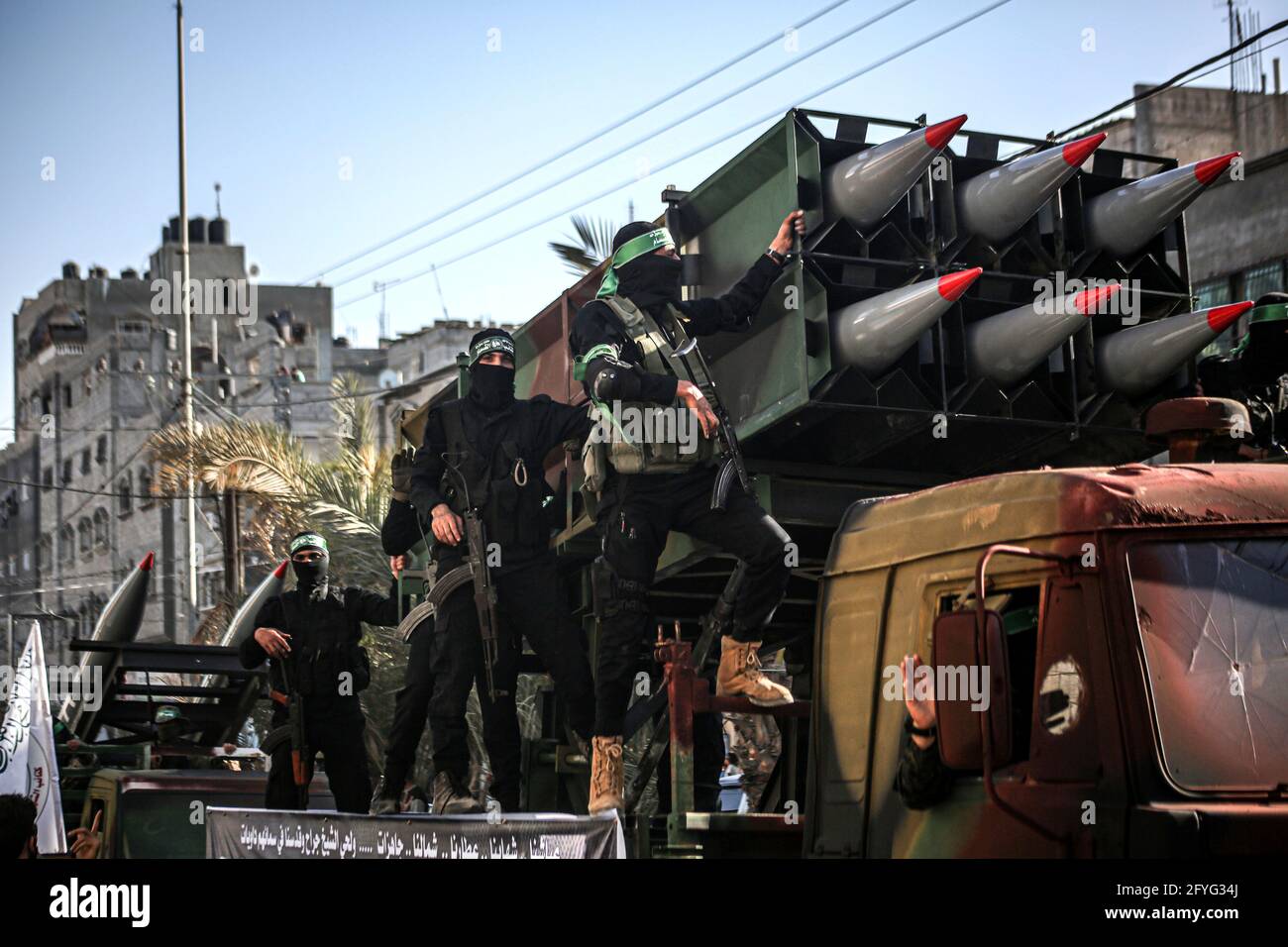 Members of the Izz al-Din al-Qassam Brigades, the military wing of ...