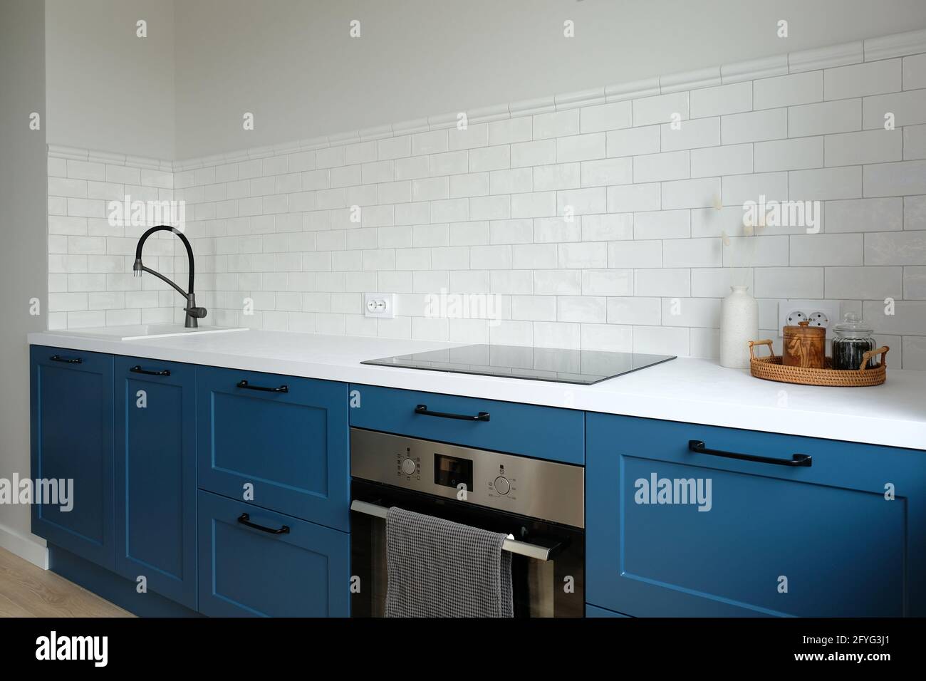 Scandinavian style kitchen interior design in blue and white colors ...