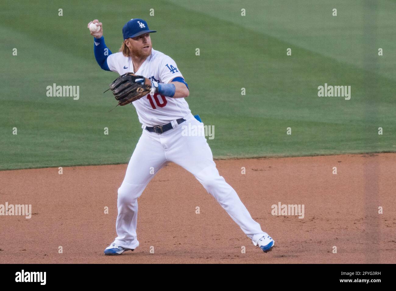 Los Angeles Dodgers third baseman Justin Turner (10) throws to first ...