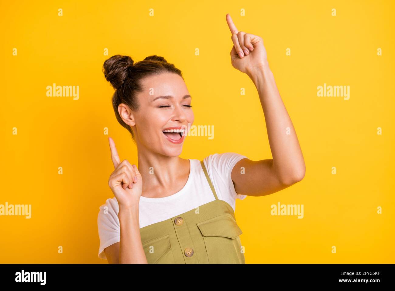 Portrait of attractive dreamy cheerful girl dancing having fun rest ...