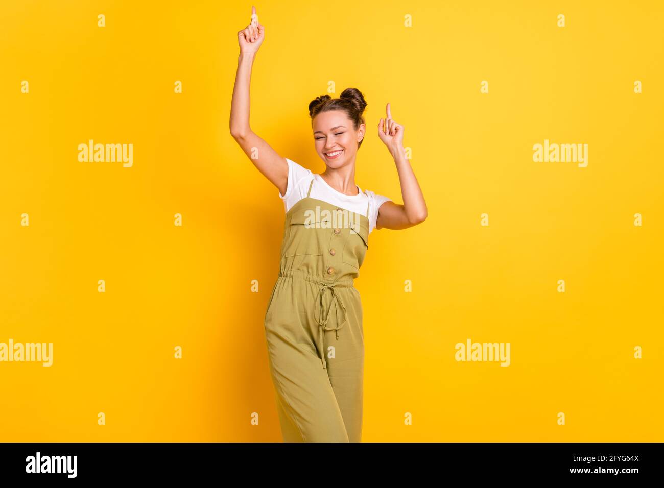 Photo of positive inspired lady dance raise fingers closed eyes wear ...