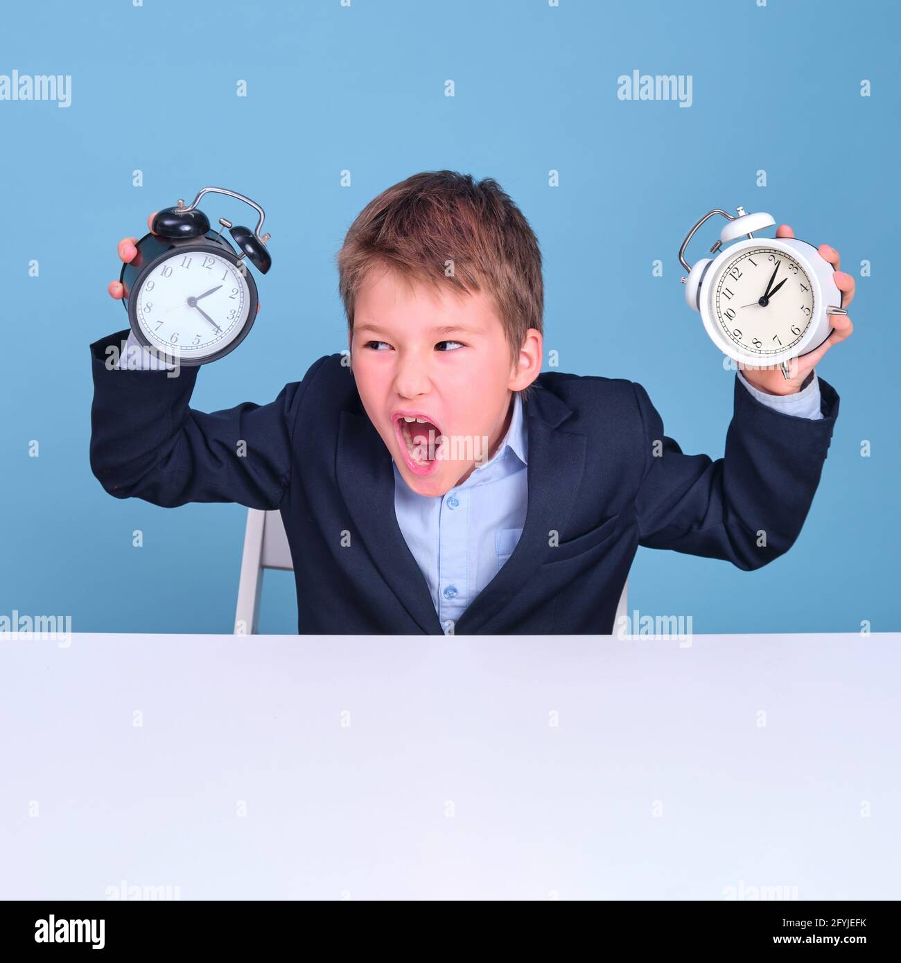 Teen boy desk uniform hi-res stock photography and images - Alamy