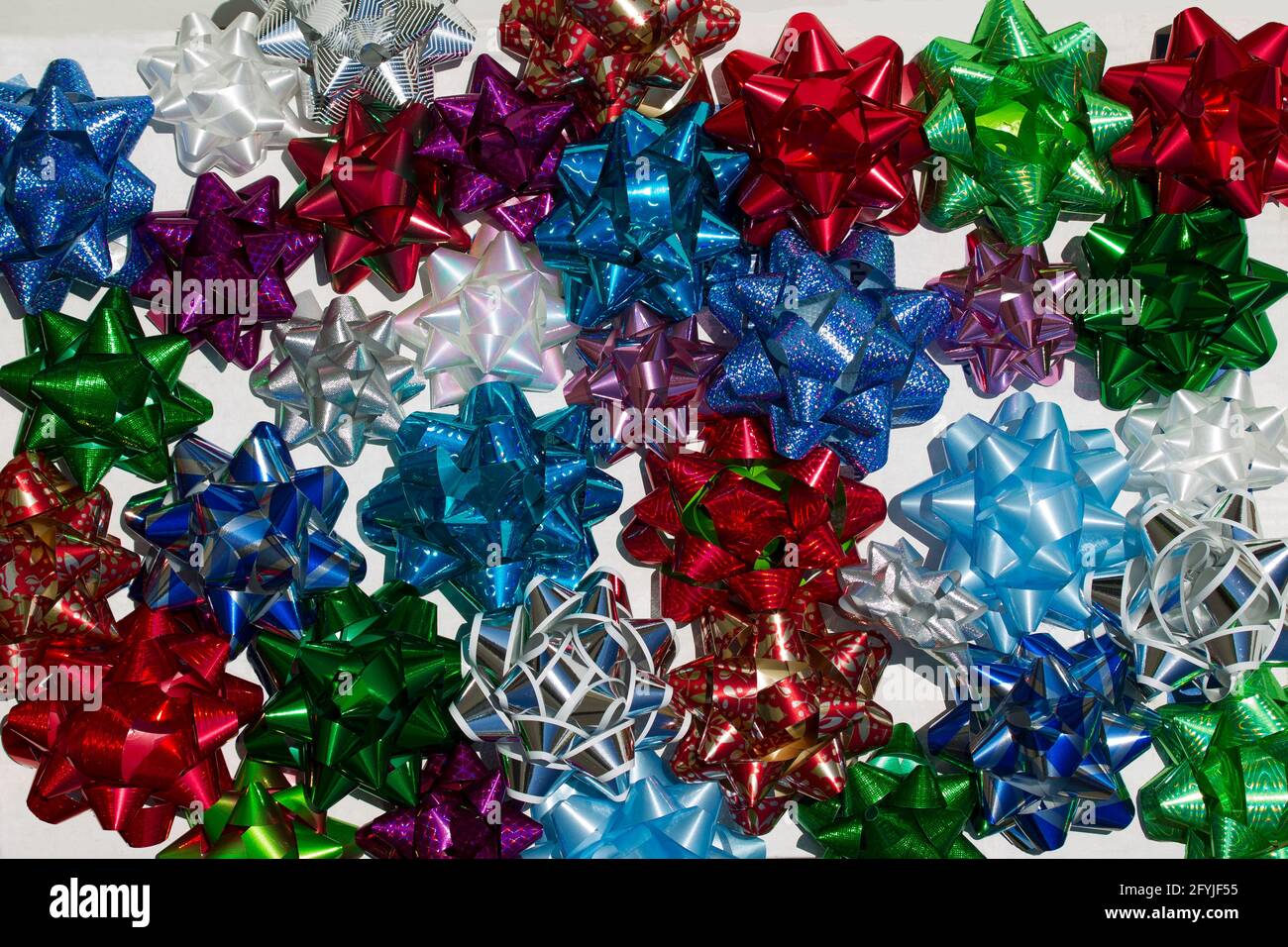 Christmas Colorful Bows Background in Details Stock Photo - Alamy