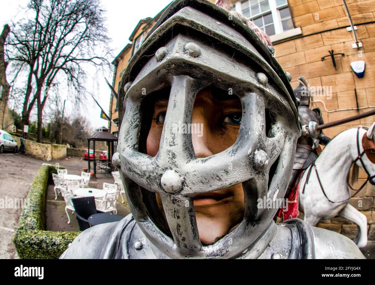 Effigy of an English knight stands guard our=tside a hotel in rural ...