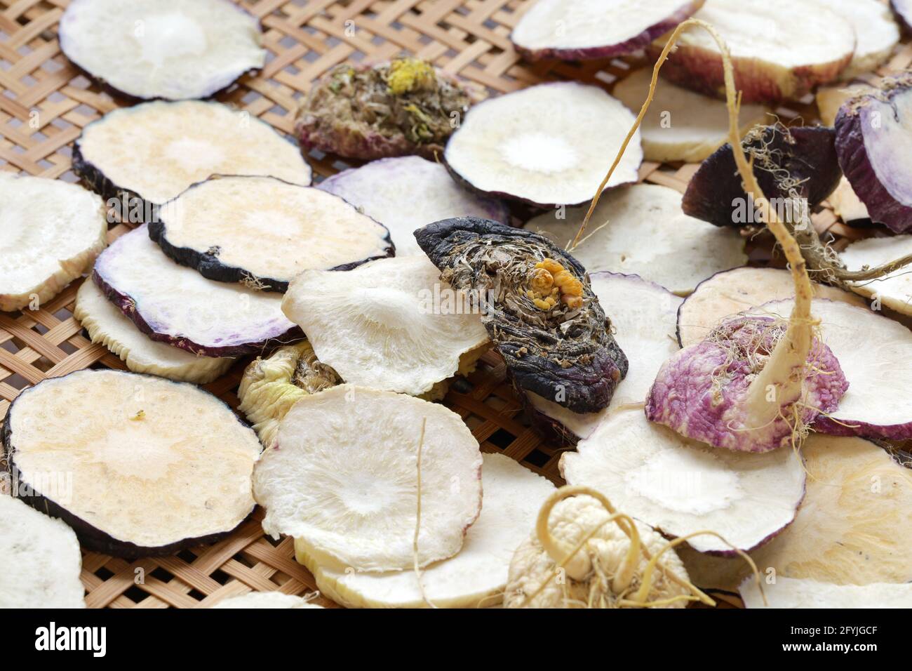 maca root slices drying on bamboo tray, peruvian superfood Stock Photo ...