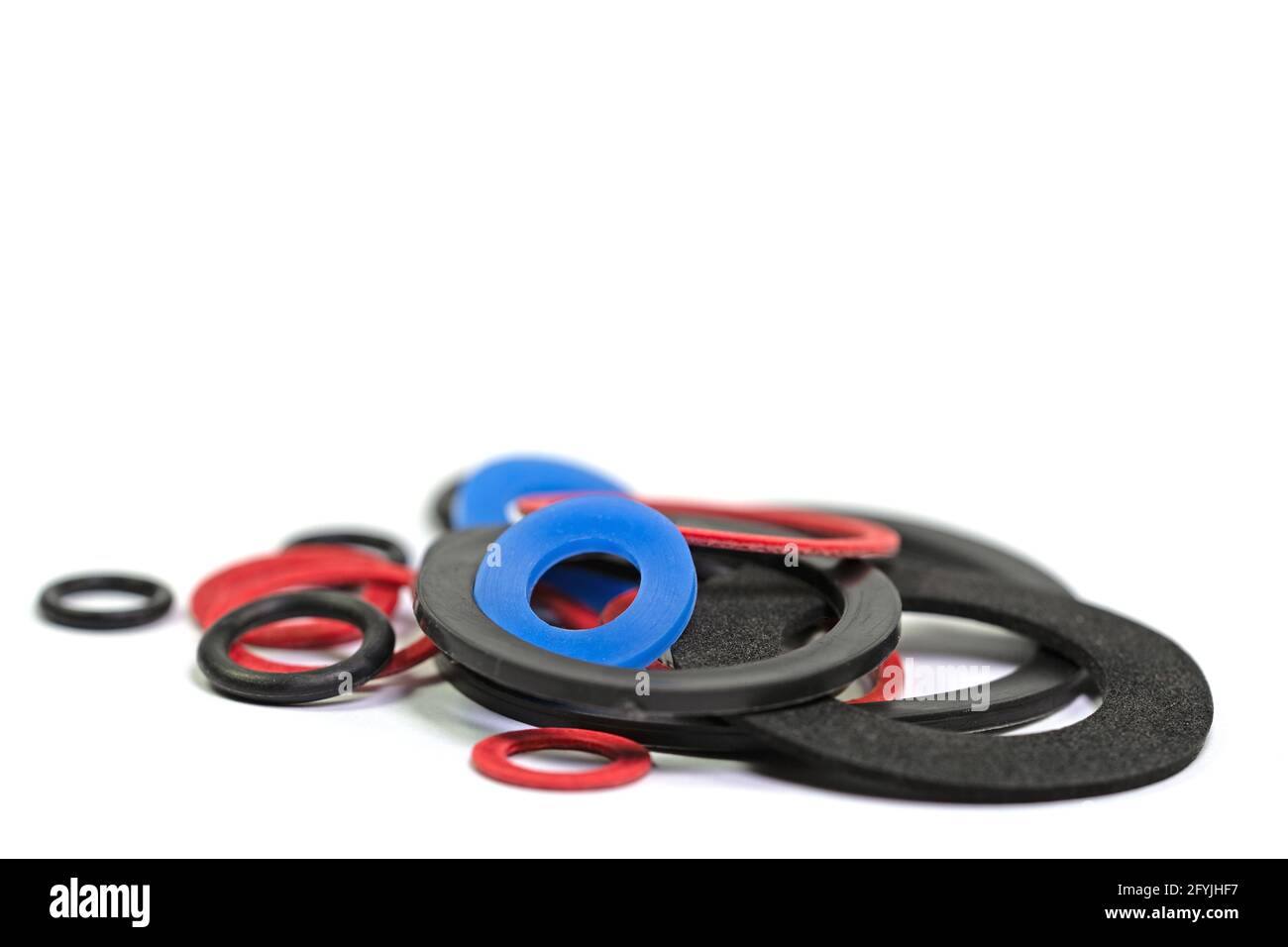 Various sealing rings against a white background Stock Photo - Alamy