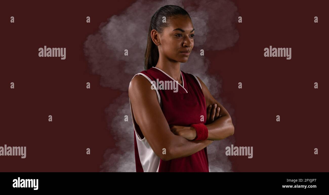 Composition of portrait of mixed race female basketball player with ...