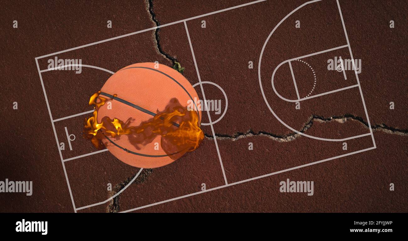 Composition of basketball on fire over cracked basketball court Stock ...