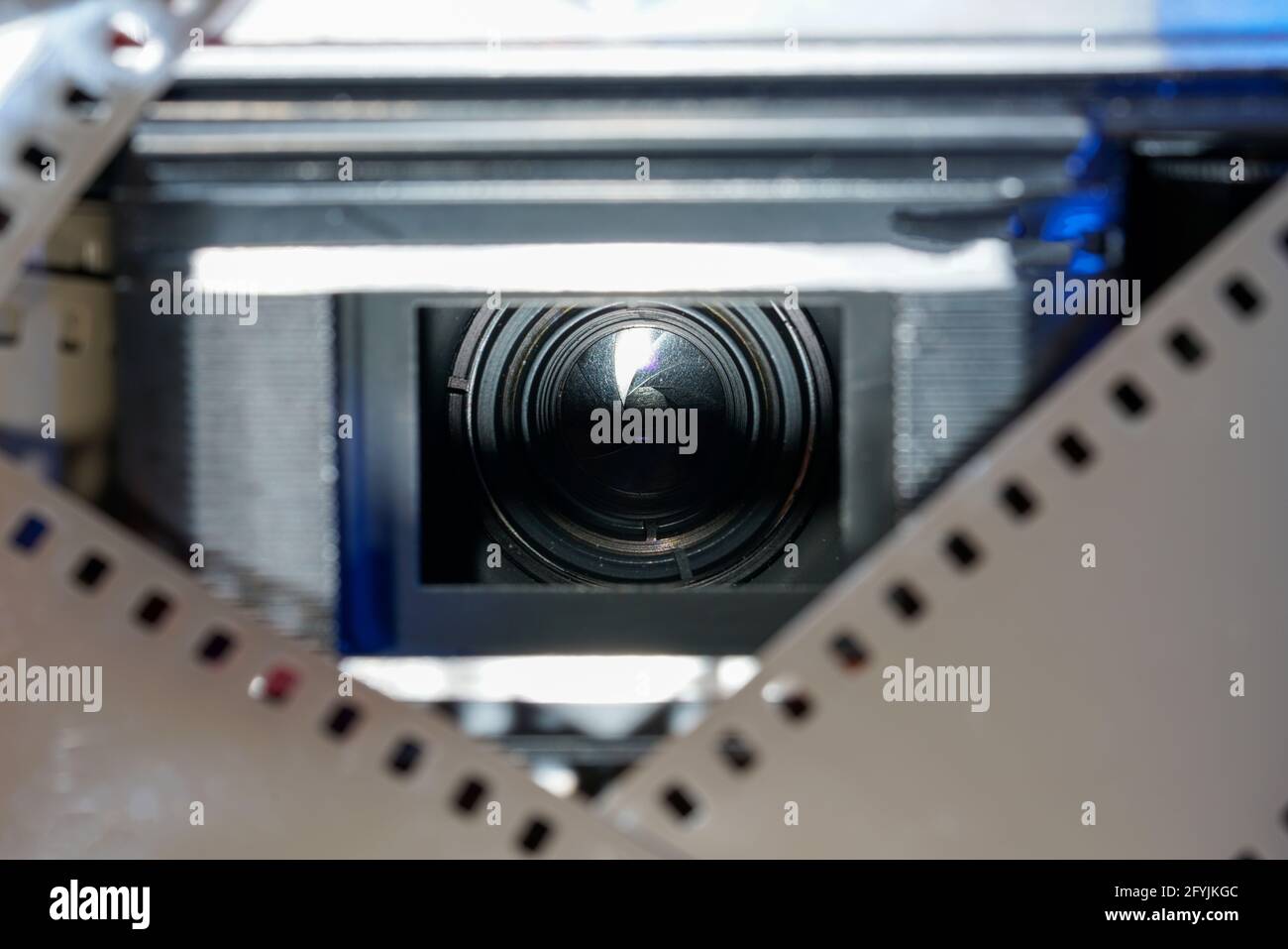 Analogue camera with Film on an colorful background photographed in the ...