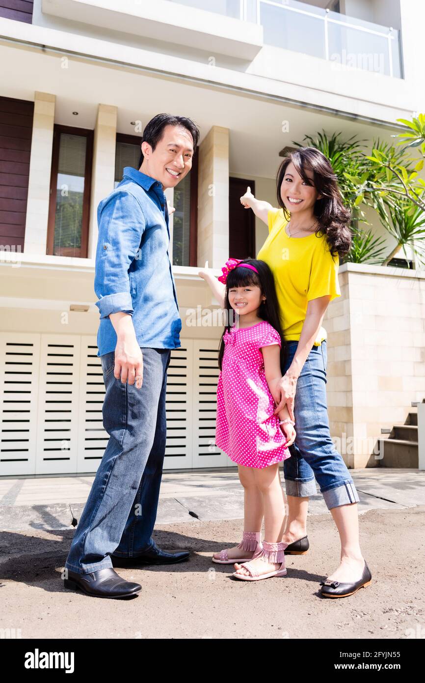 Chinese Family in front of house in residential area in Asia Stock ...