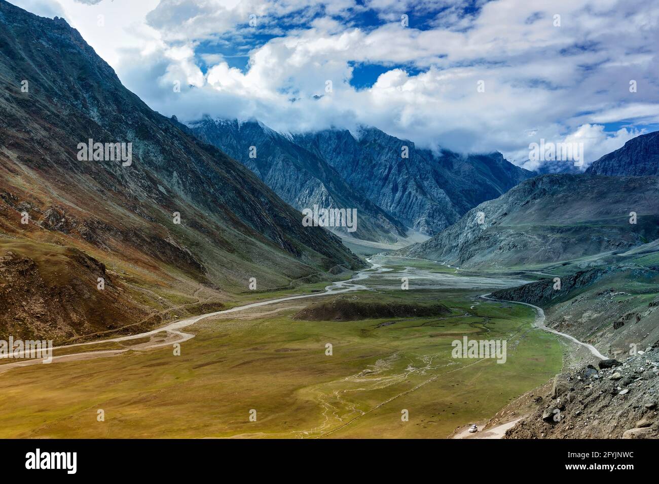 Aerial view of green and rocky landscape of Kargil, with mountain peaks ...