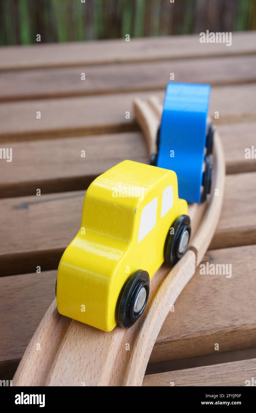 Wooden toy cars on table Stock Photo - Alamy