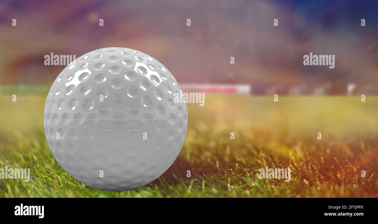 Composition of golf ball in grass with copy space and clouds in ...
