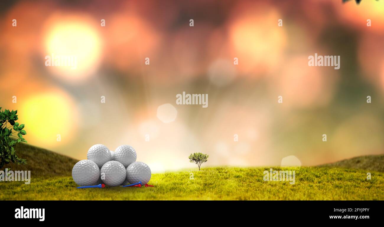 Composition of stack of golf balls in grass with tees and copy space ...