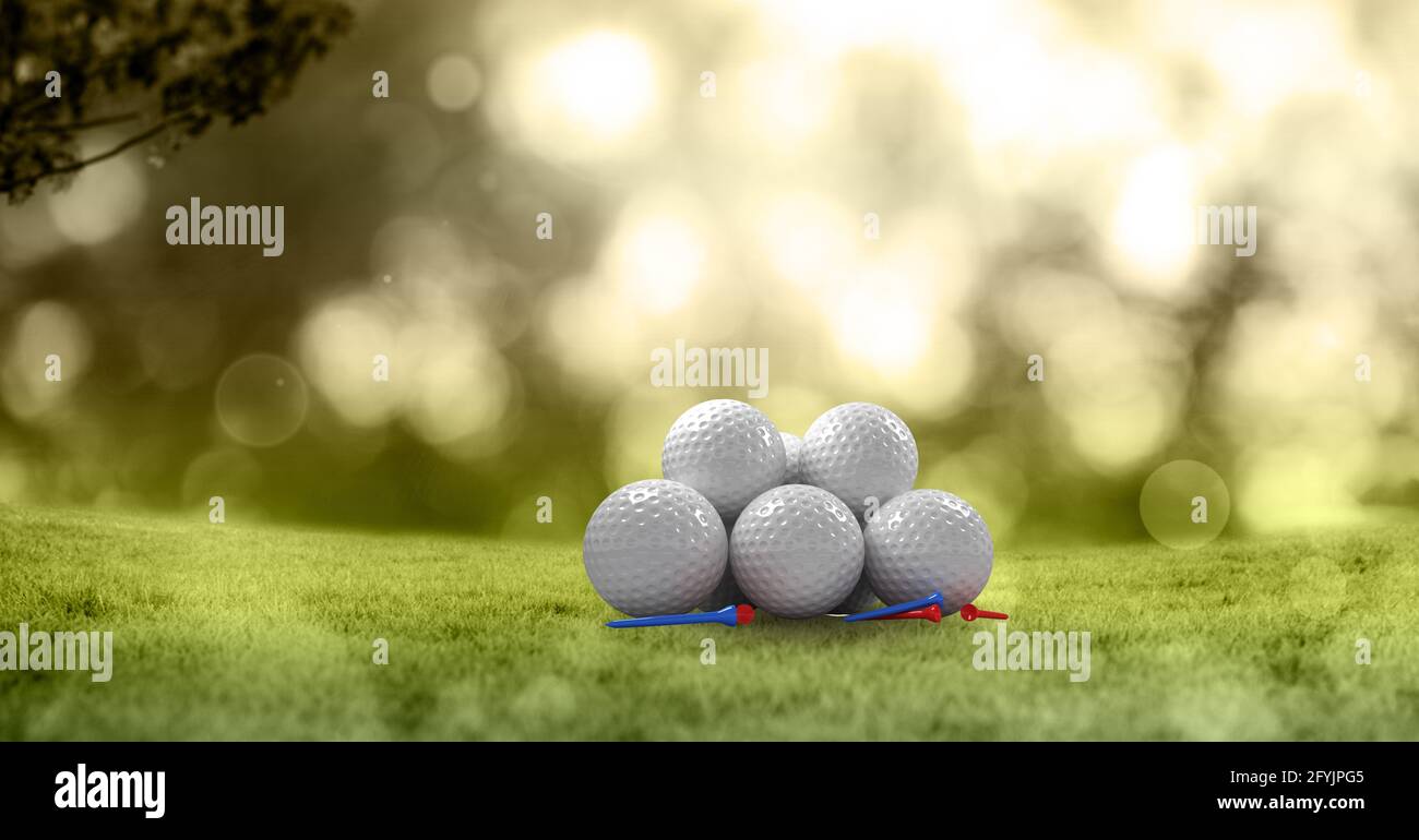 Composition of stack of golf balls in grass with tees and copy space ...