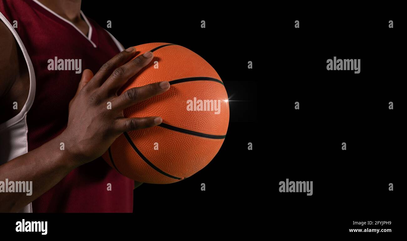 Composition of midsection of male basketball player with ball and copy ...