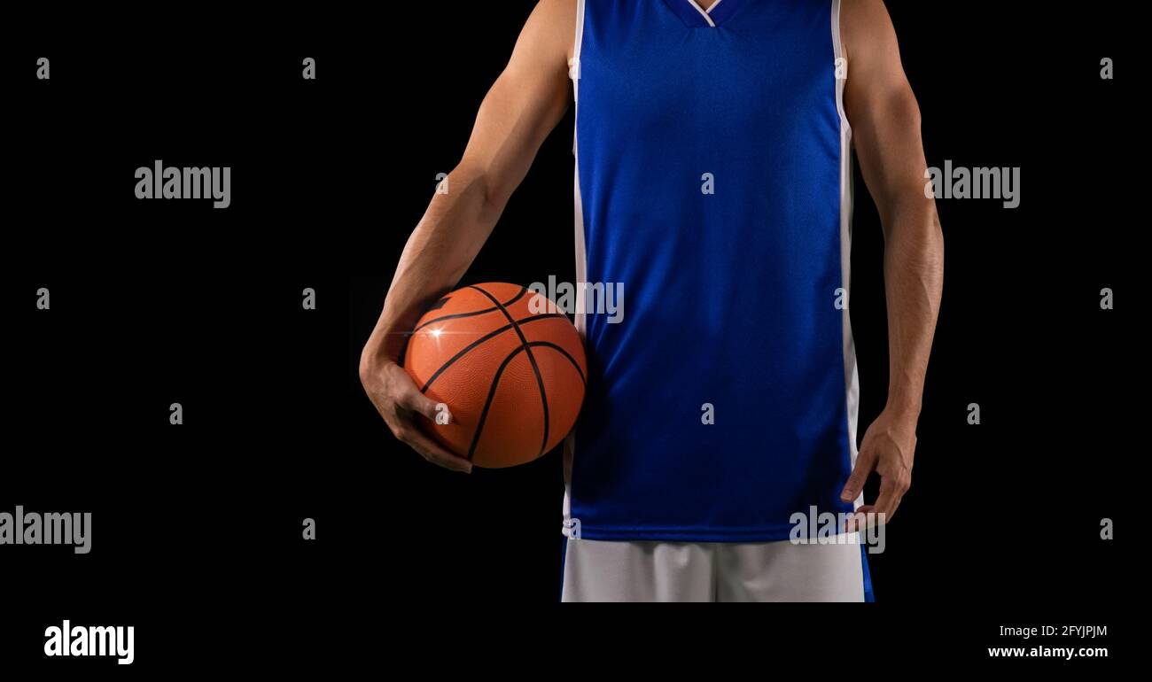 Composition of midsection of male basketball player with ball and copy ...