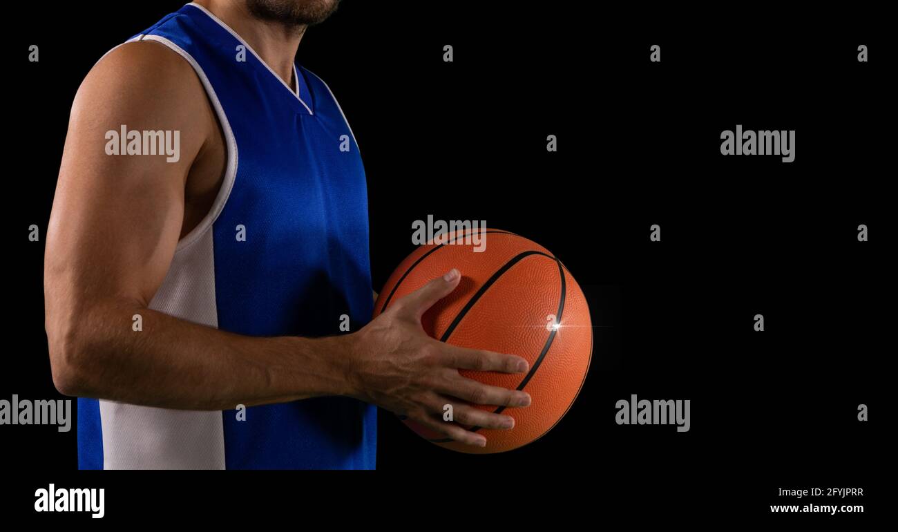 Composition of midsection of male basketball player with ball and copy ...