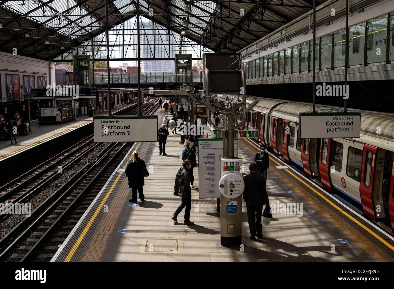 People seen at train station in London, Britain Stock Photo - Alamy