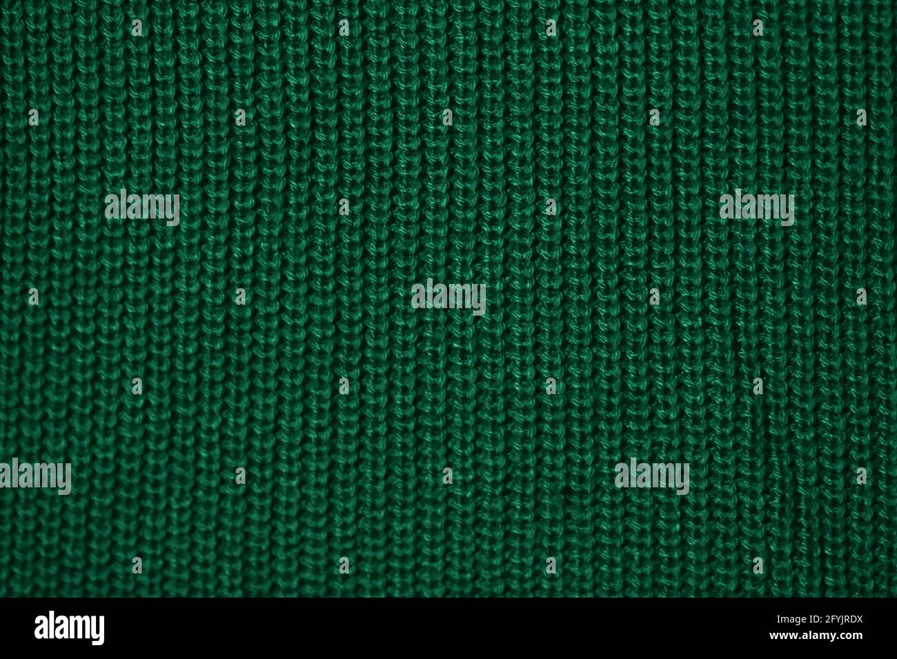 Closeup shot of a piece of green woven wool fabric Stock Photo - Alamy