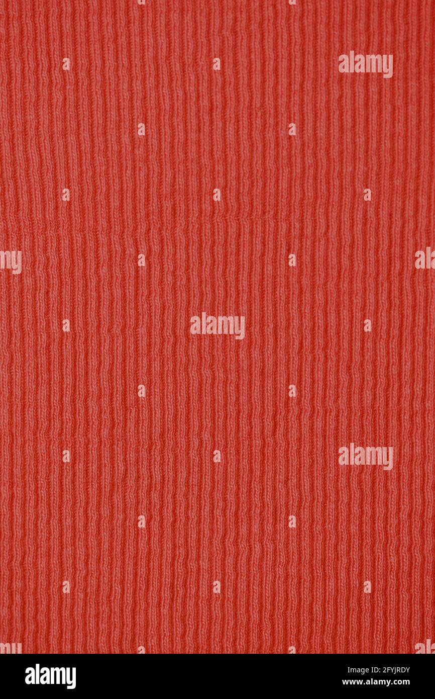 Vertical closeup shot of a textured orange background for wallpapers ...