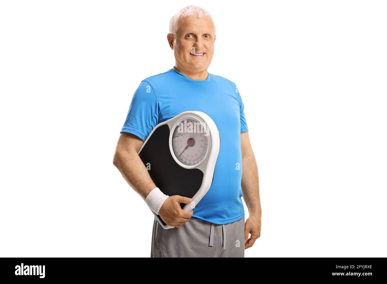 Smiling mature man holding a weight scale isolated on white background ...