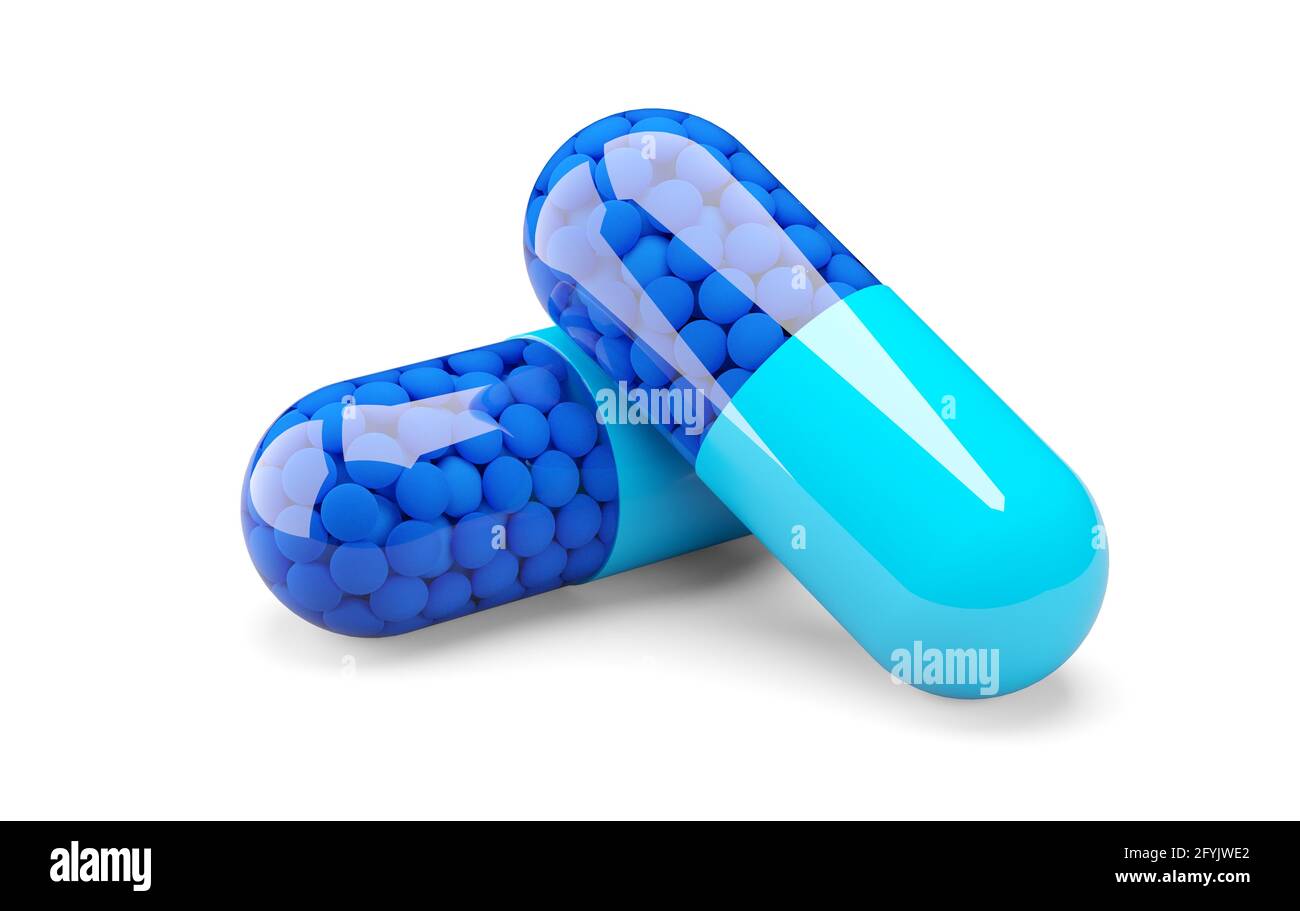 Two blue pill capsules over white background, medical treatment ...