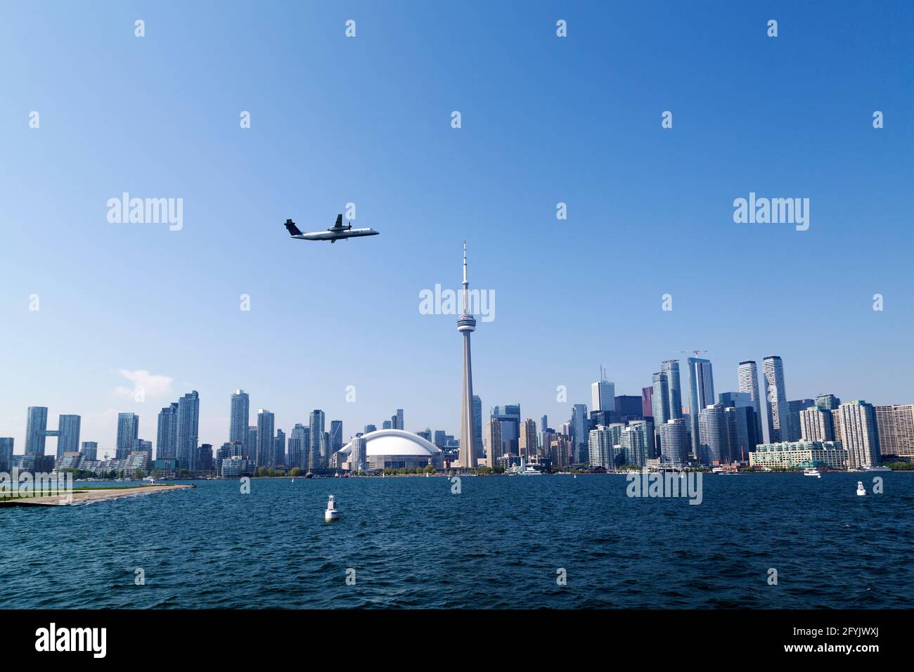 An aircraft takes off from Billy Bishop Toronto City Airport n Toronto ...
