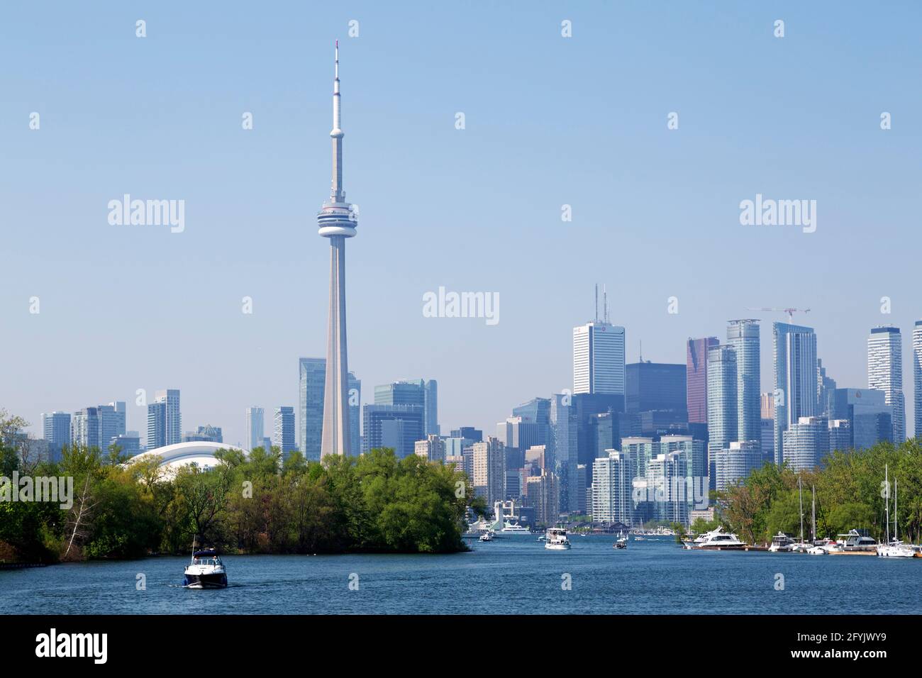 The domed roof of the Rogers Centre baseball stadium and CN Tower are ...