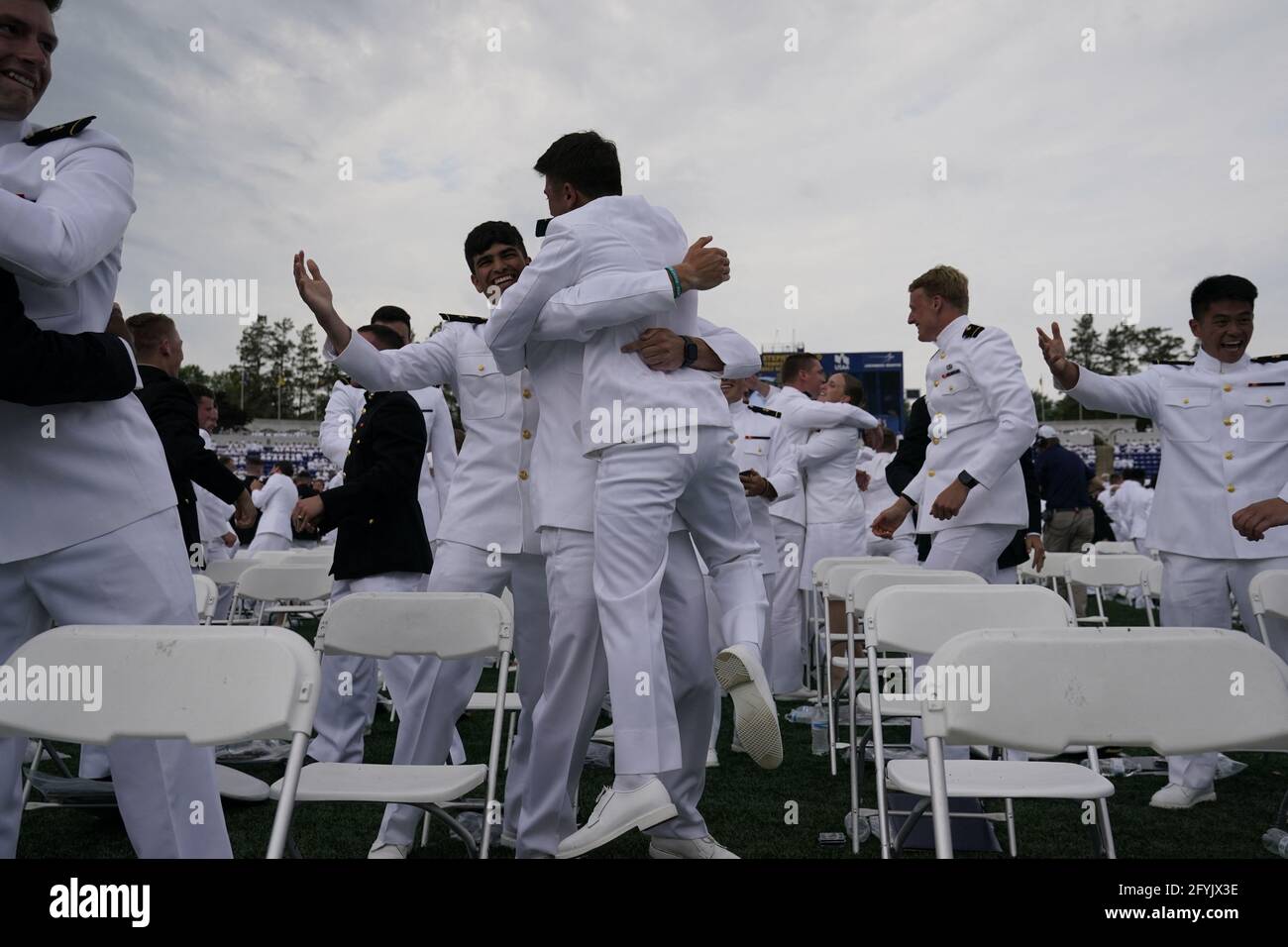 United States Naval Academy Class of 2021 graduates embrace at the end ...