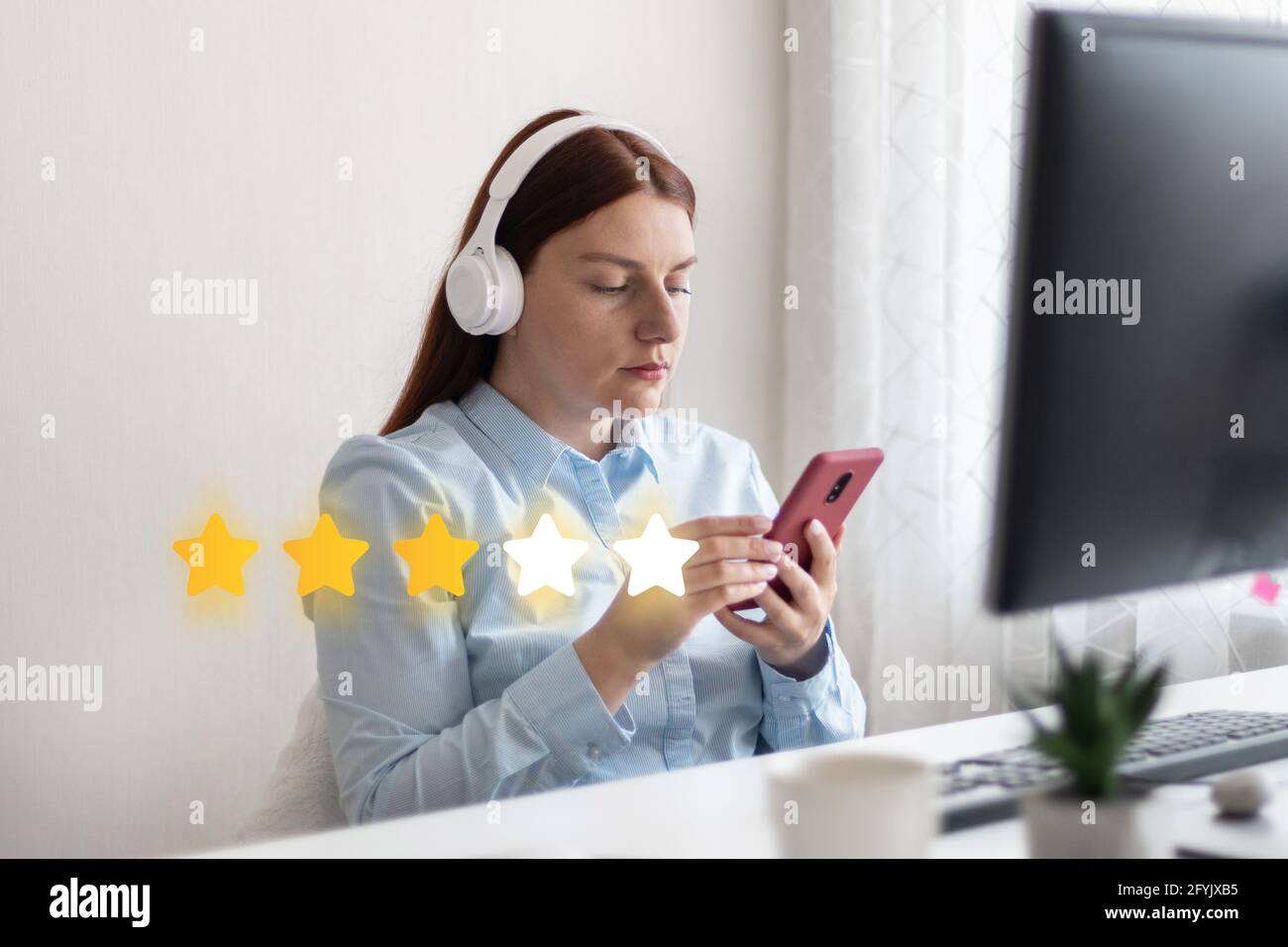 Business woman making facetime video calling with smartphone at work ...