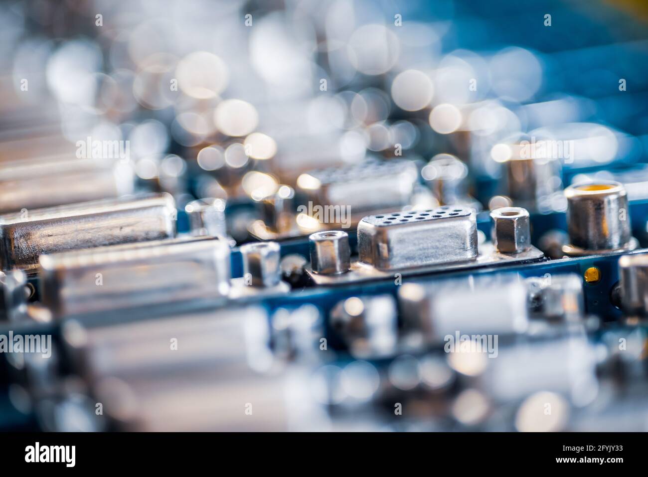Close-up blurry metal sockets on a computer video board. Concept for ...