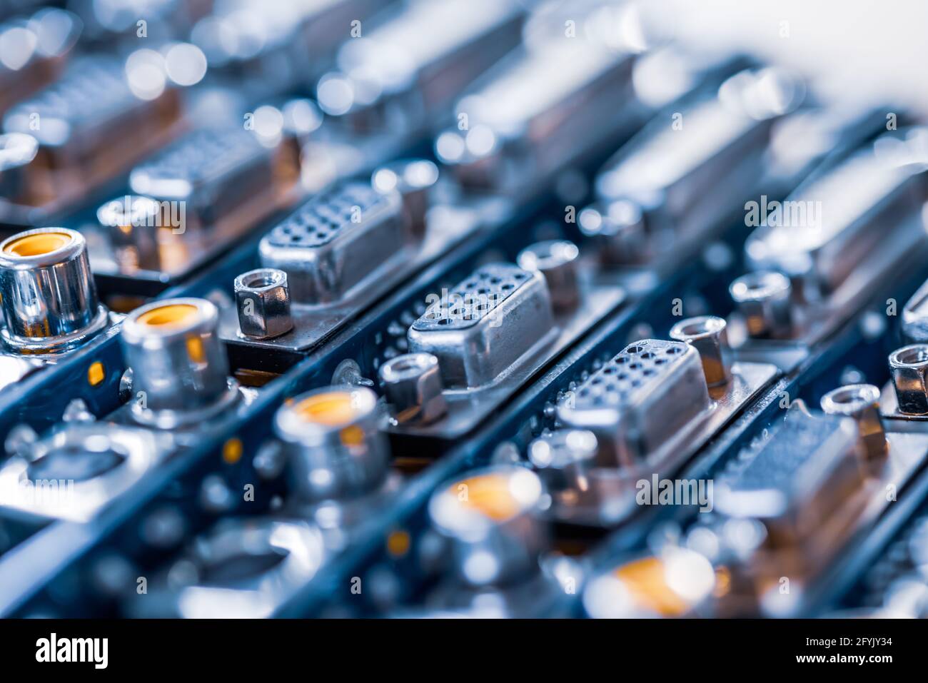 Close-up blurry metal sockets on a computer video board. Concept for ...