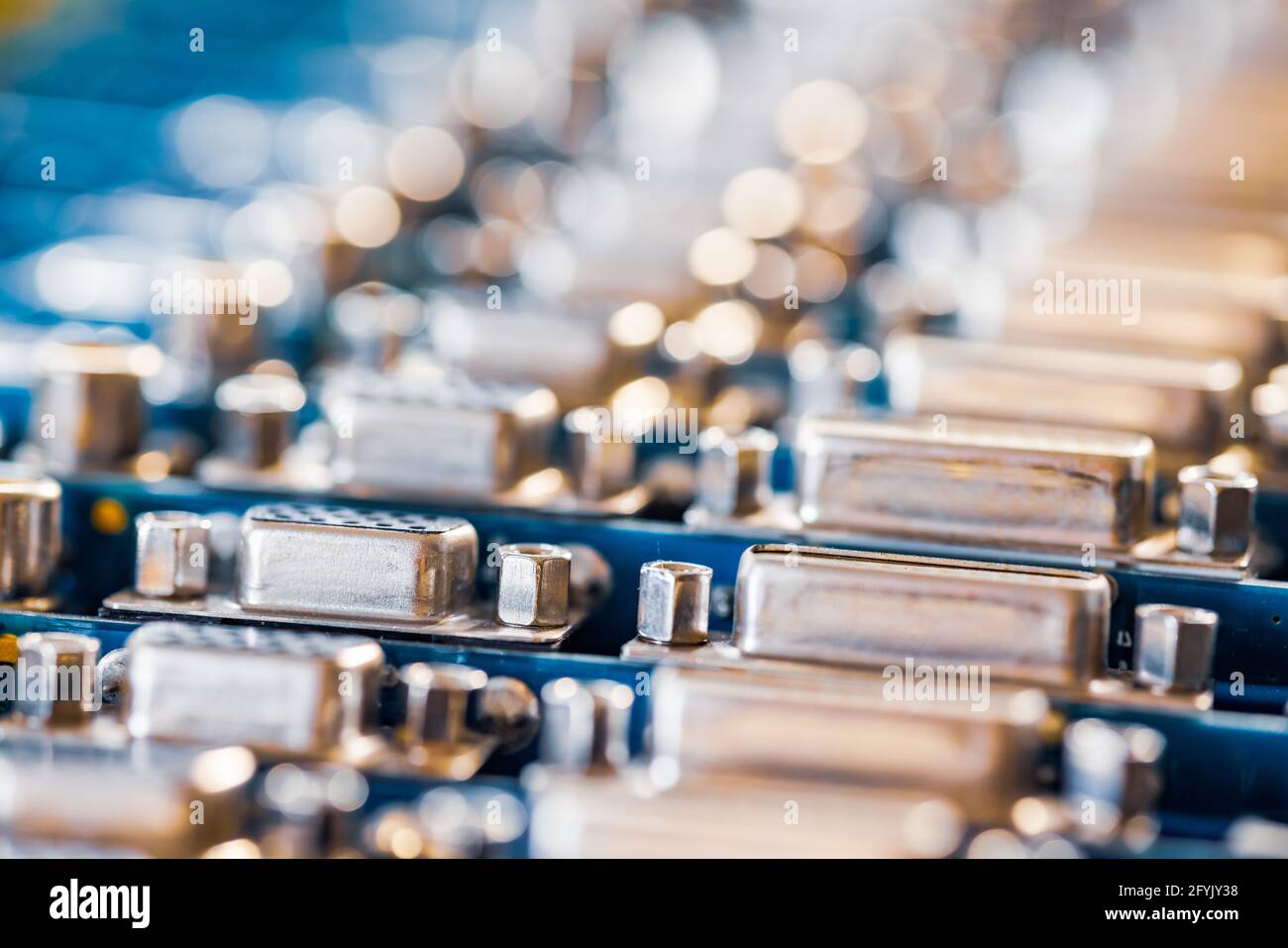 Close-up blurry metal sockets on a computer video board. Concept for ...