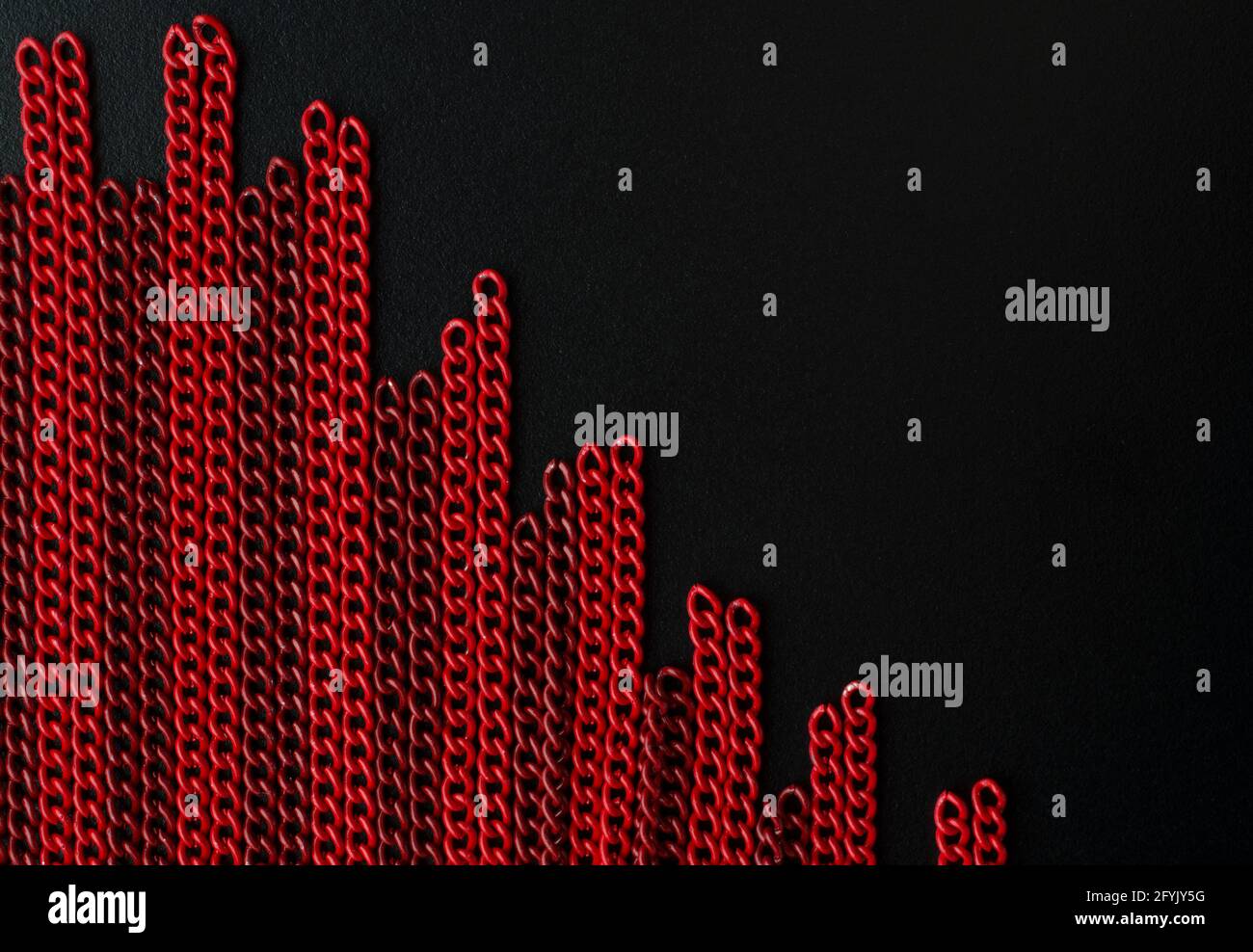 texture of a red chain on a black background Stock Photo - Alamy