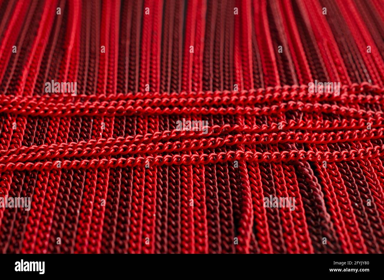 texture of a red chain on a black background Stock Photo - Alamy