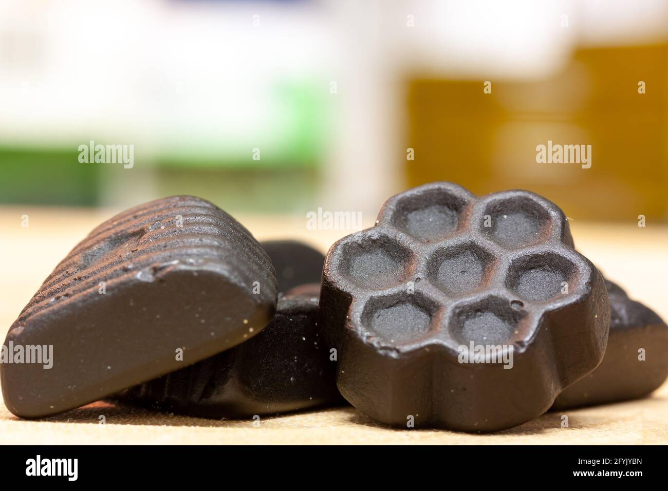 Beehive and honeycomb shape chocolates Stock Photo - Alamy