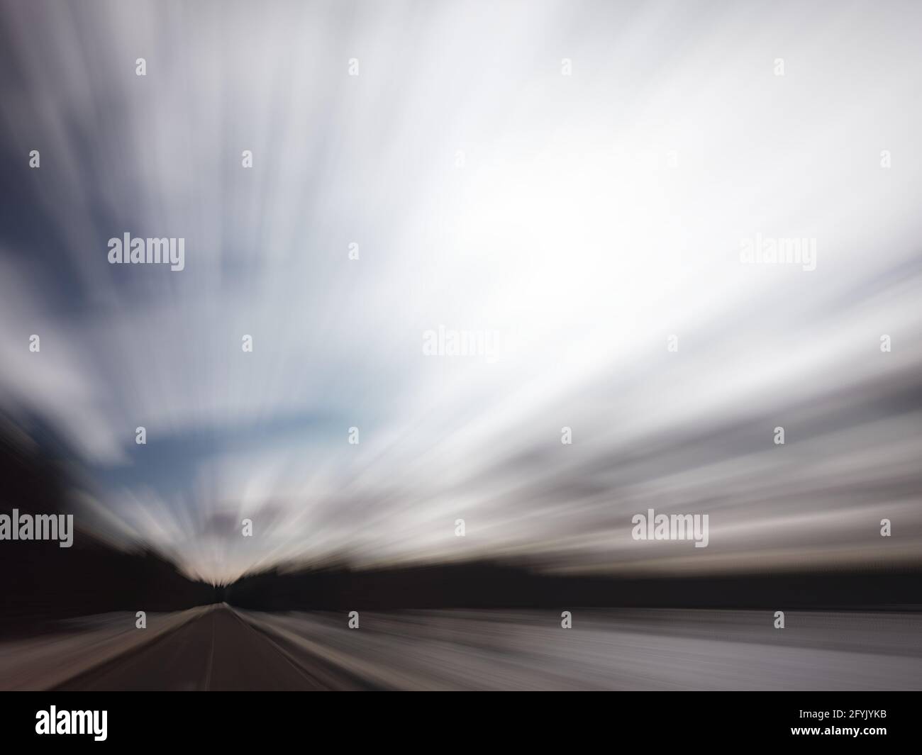 Blurred shot of backlit forest, symbolizing speed Stock Photo - Alamy