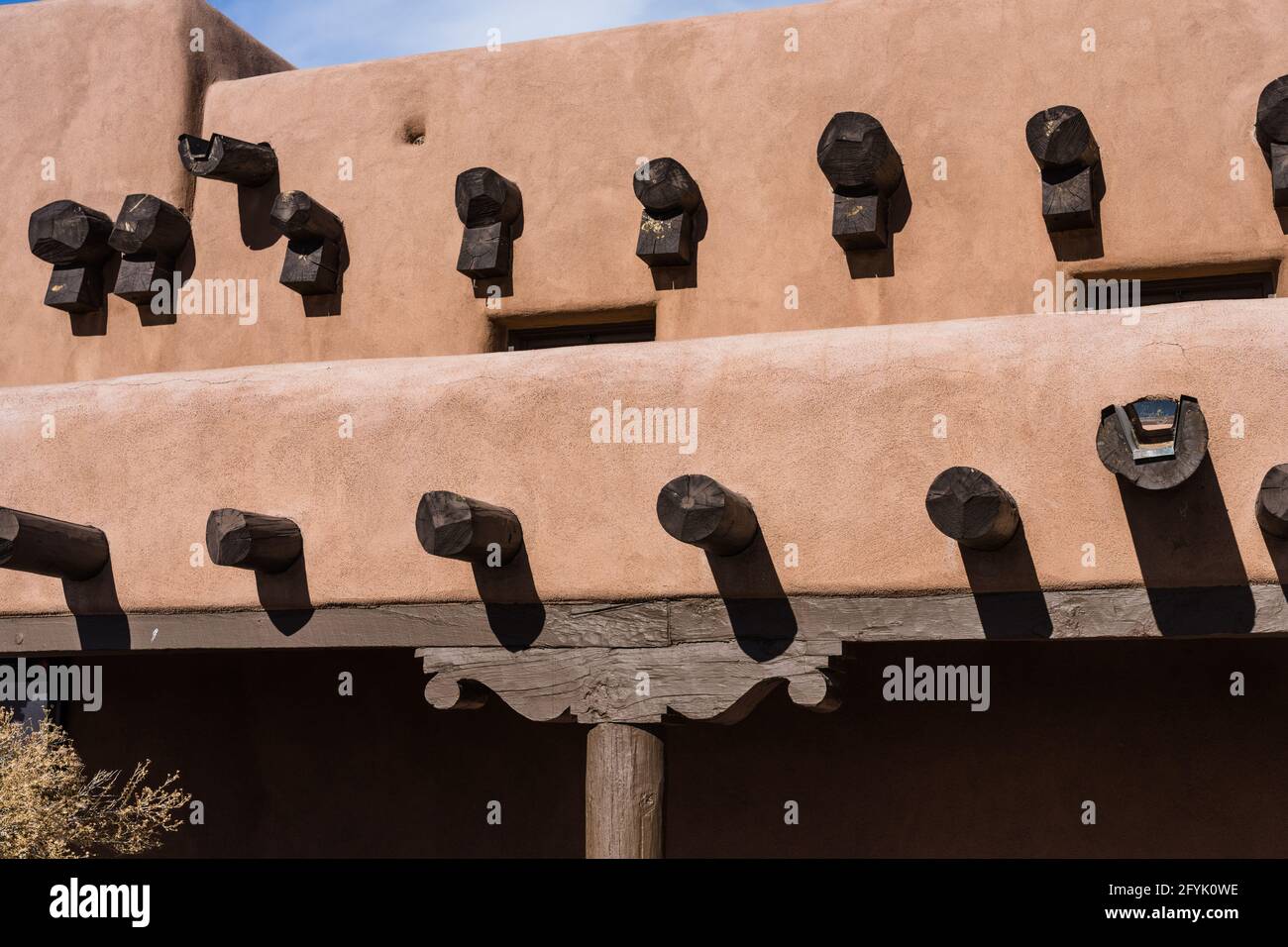 VIgas or wooden beams are typical of the pueblo-style architecture used ...