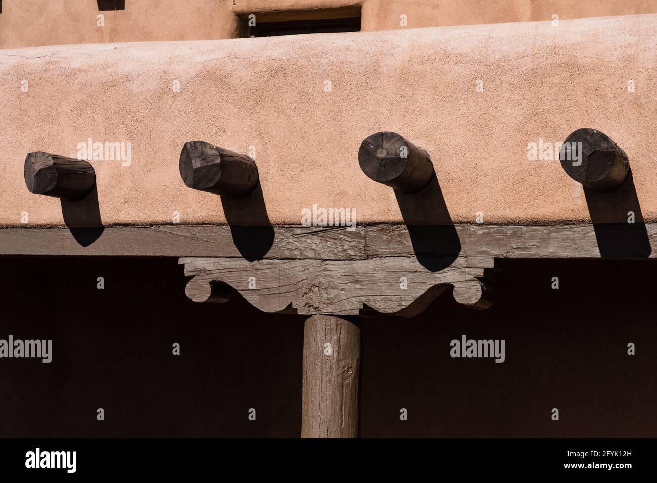 VIgas or wooden beams are typical of the pueblo-style architecture used ...