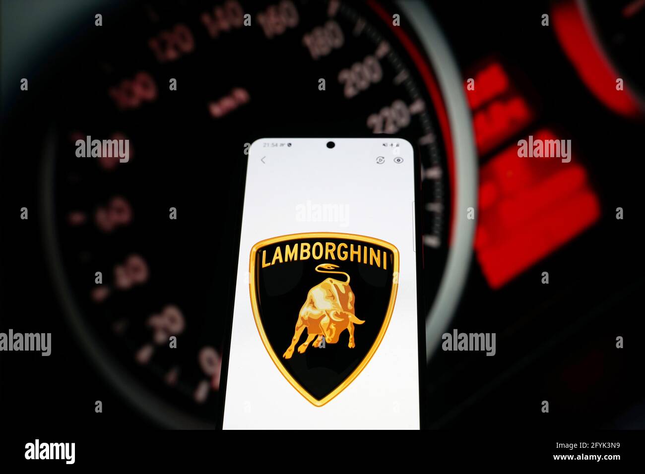 In this photo illustration a car brand logo "Lamborghini" seen ...