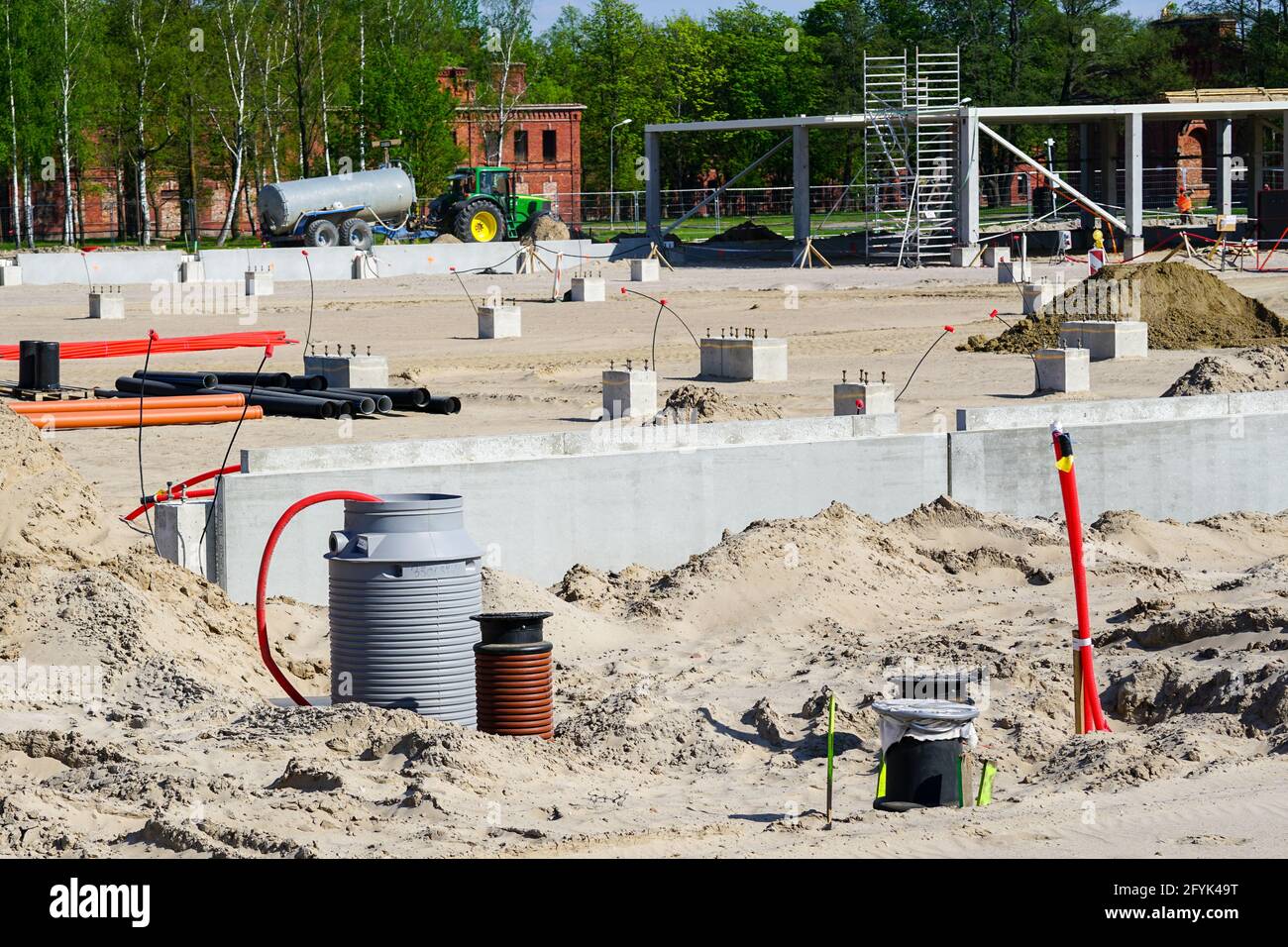 colorful view of the construction site with various tubular and other ...
