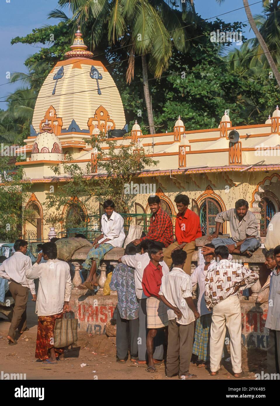 CALANGUTE, GOA STATE, INDIA - Men gather at Shantadurga hindu temple ...