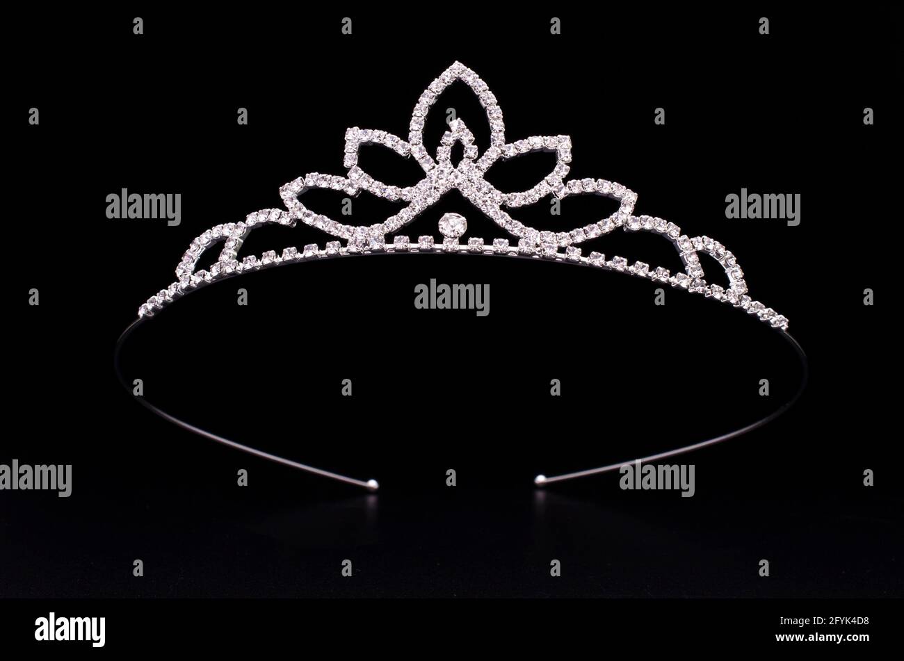 silver tiara isolated on a black background Stock Photo - Alamy