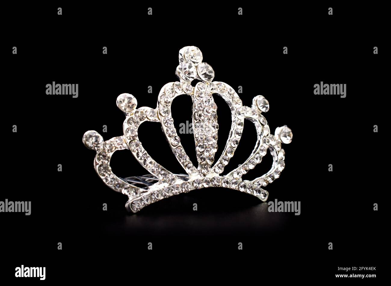 silver tiara isolated on a black background Stock Photo - Alamy