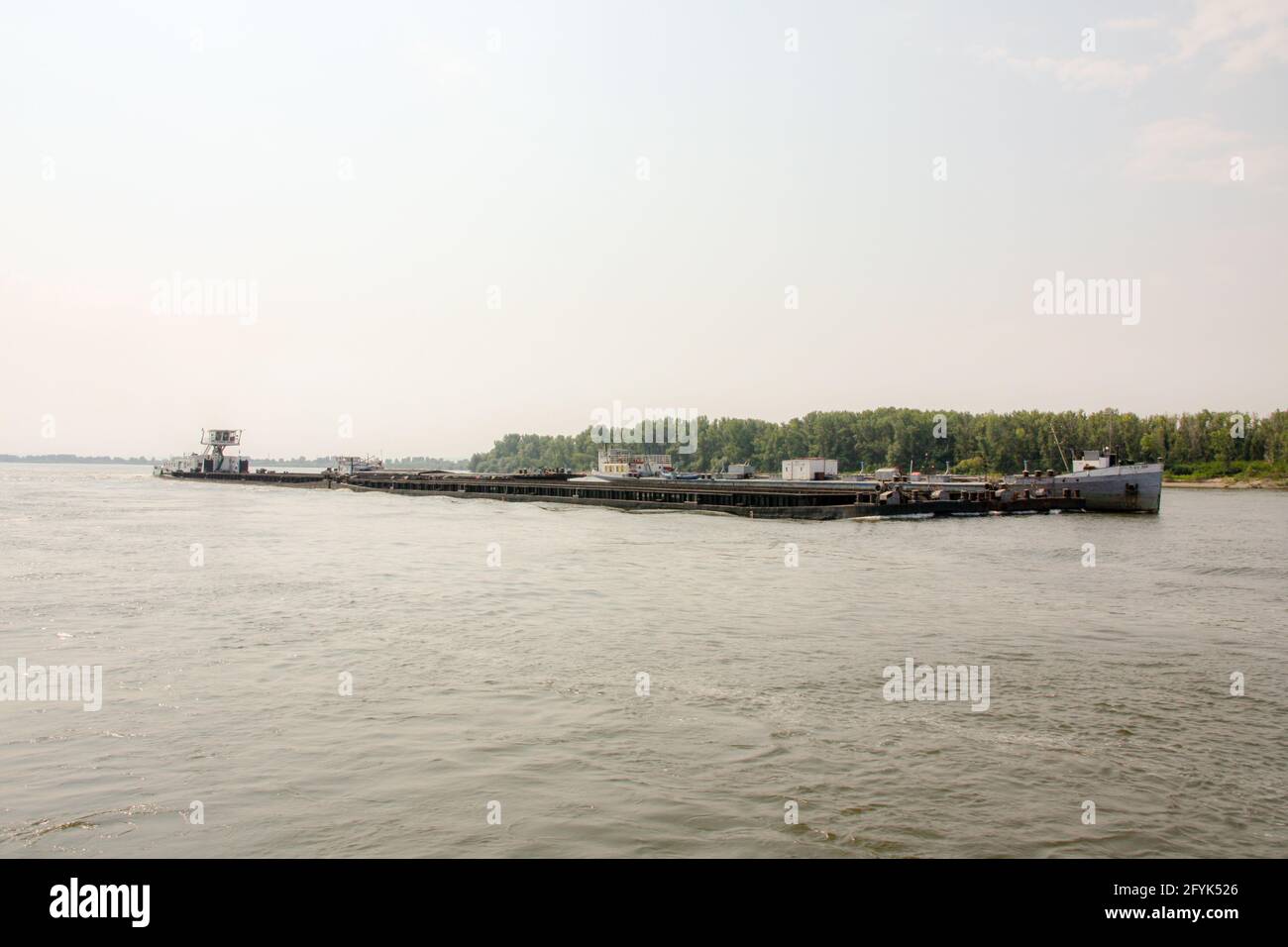 Cargo ship on Danube river Stock Photo - Alamy